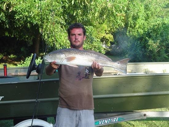 In the surf catching a few small flounder, puppy drum, black drum ...